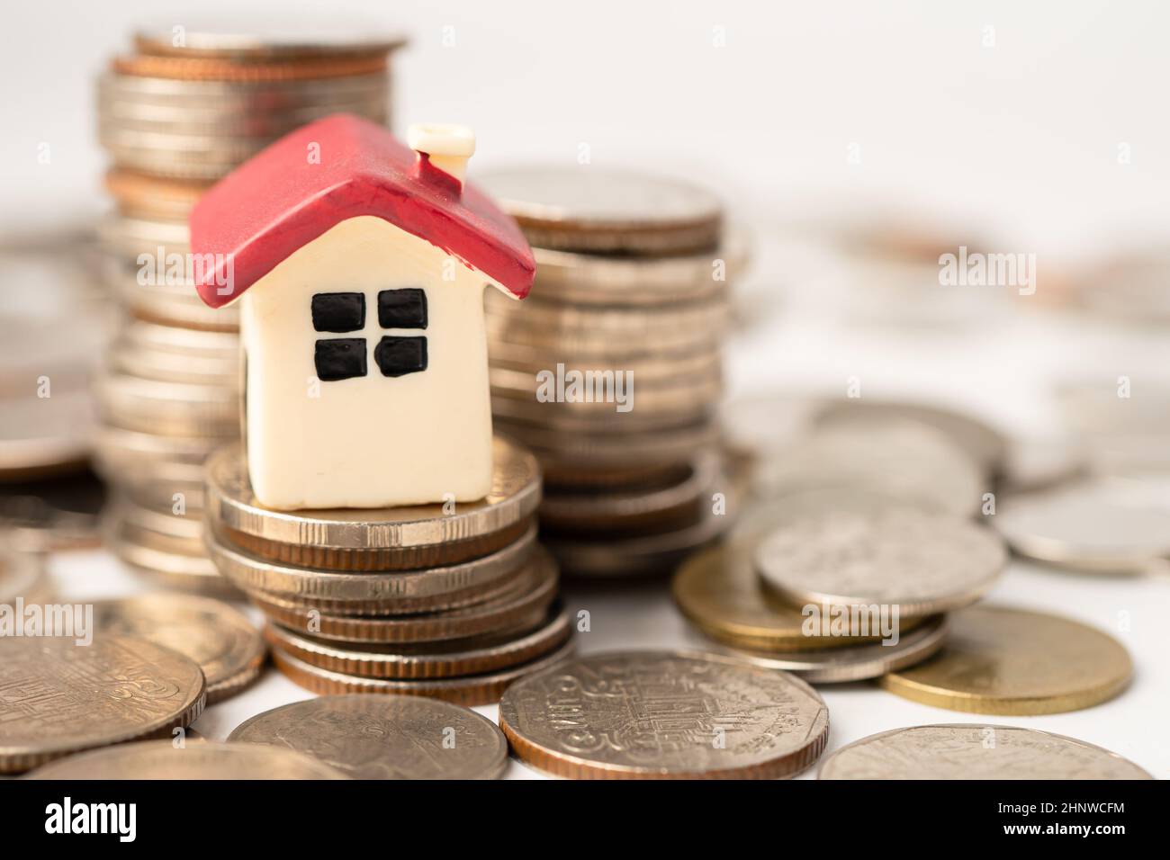 House on stack coins, mortgage home loan finance concept Stock Photo ...