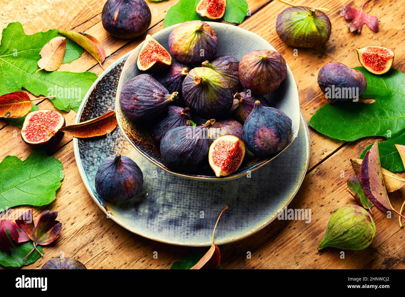 Fresh fig fruits.Tropical fruits on old wooden table Stock Photo - Alamy