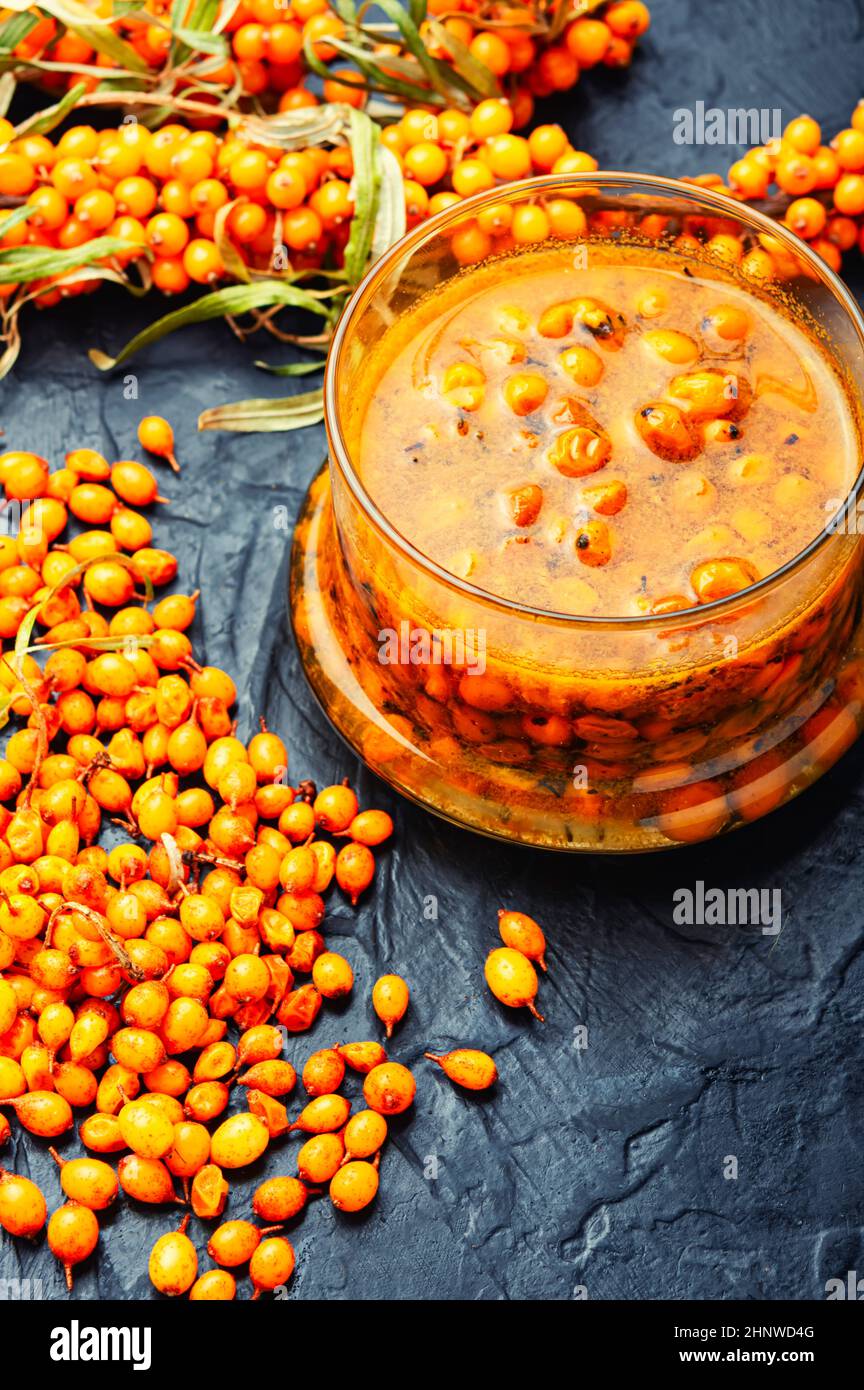 Healthy sea buckthorn jam. Homemade berry jam. Preserved berry Stock ...