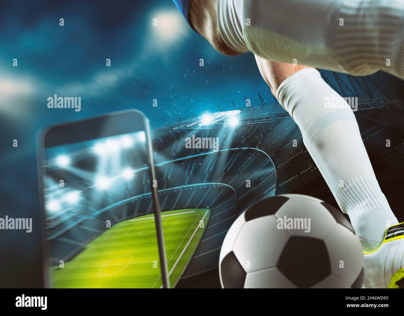 Soccer player, cellphone and ball on a stadium Stock Photo - Alamy