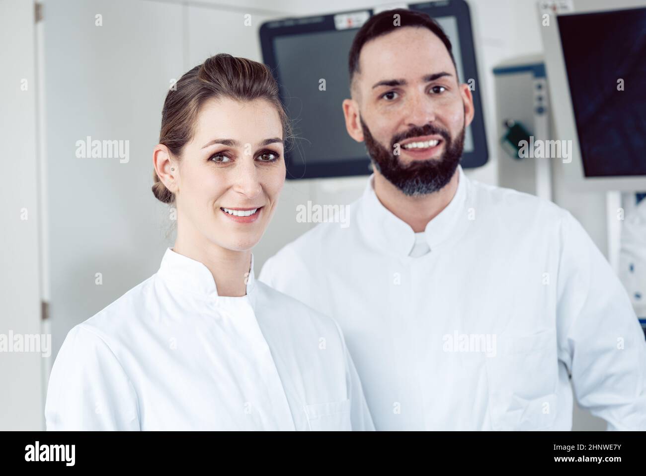 Two doctors in a hospital in front of medical screen Stock Photo - Alamy
