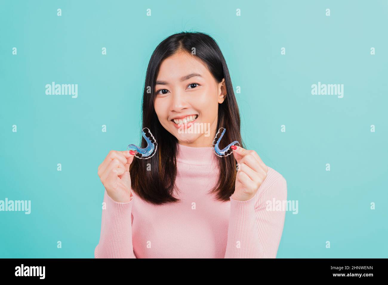 Portrait Asian beautiful young woman smiling hold silicone orthodontic ...