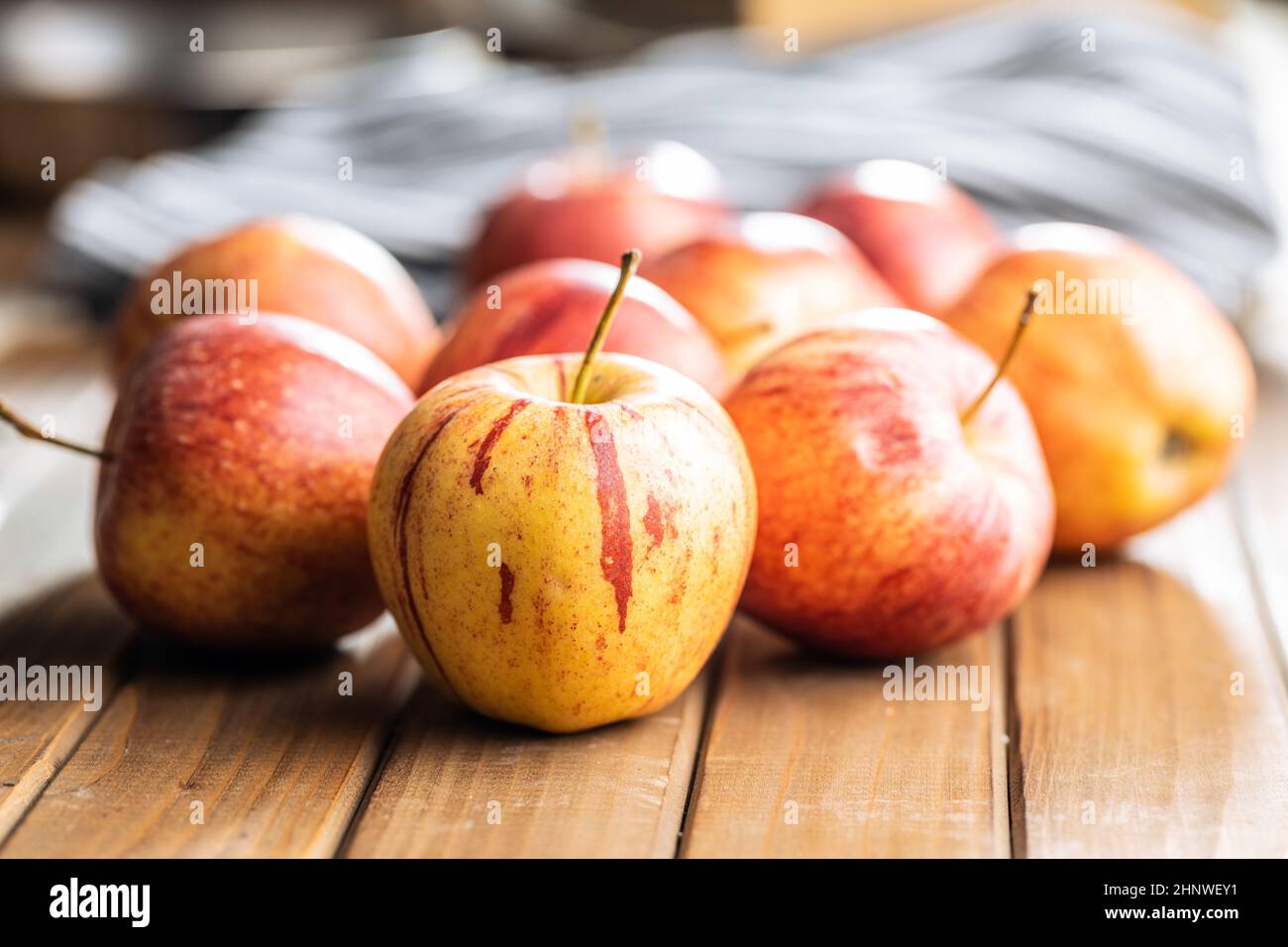 Fresh autumn apples on wooden table Stock Photo - Alamy