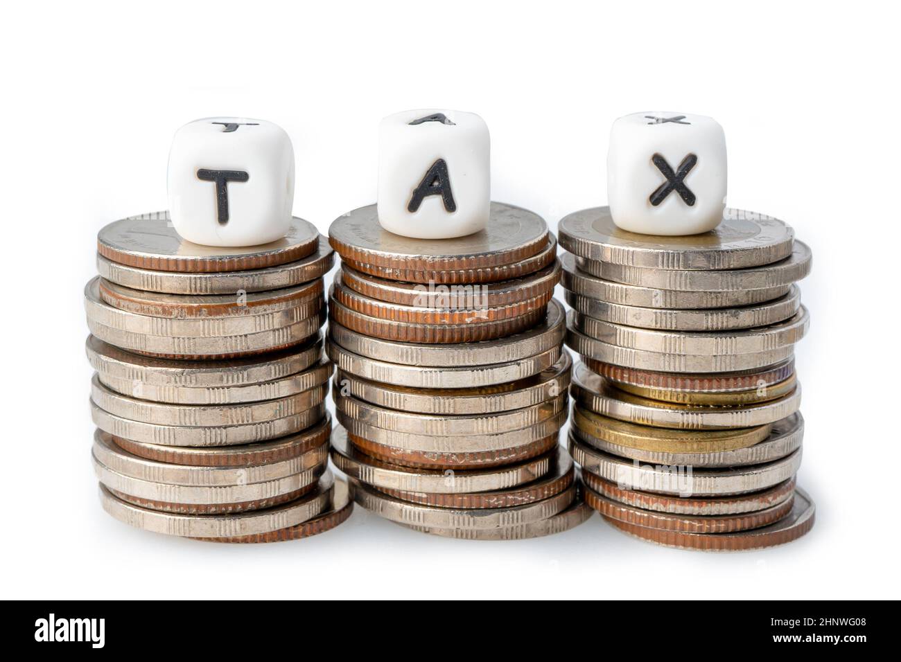 TAX alphabet on stack of coins from salary payment income for office ...