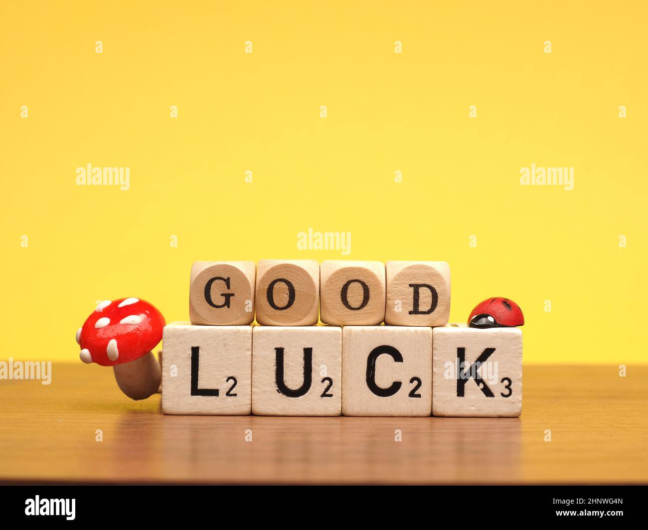 Good luck on wooden blocks and decoration on a yellow background, New ...