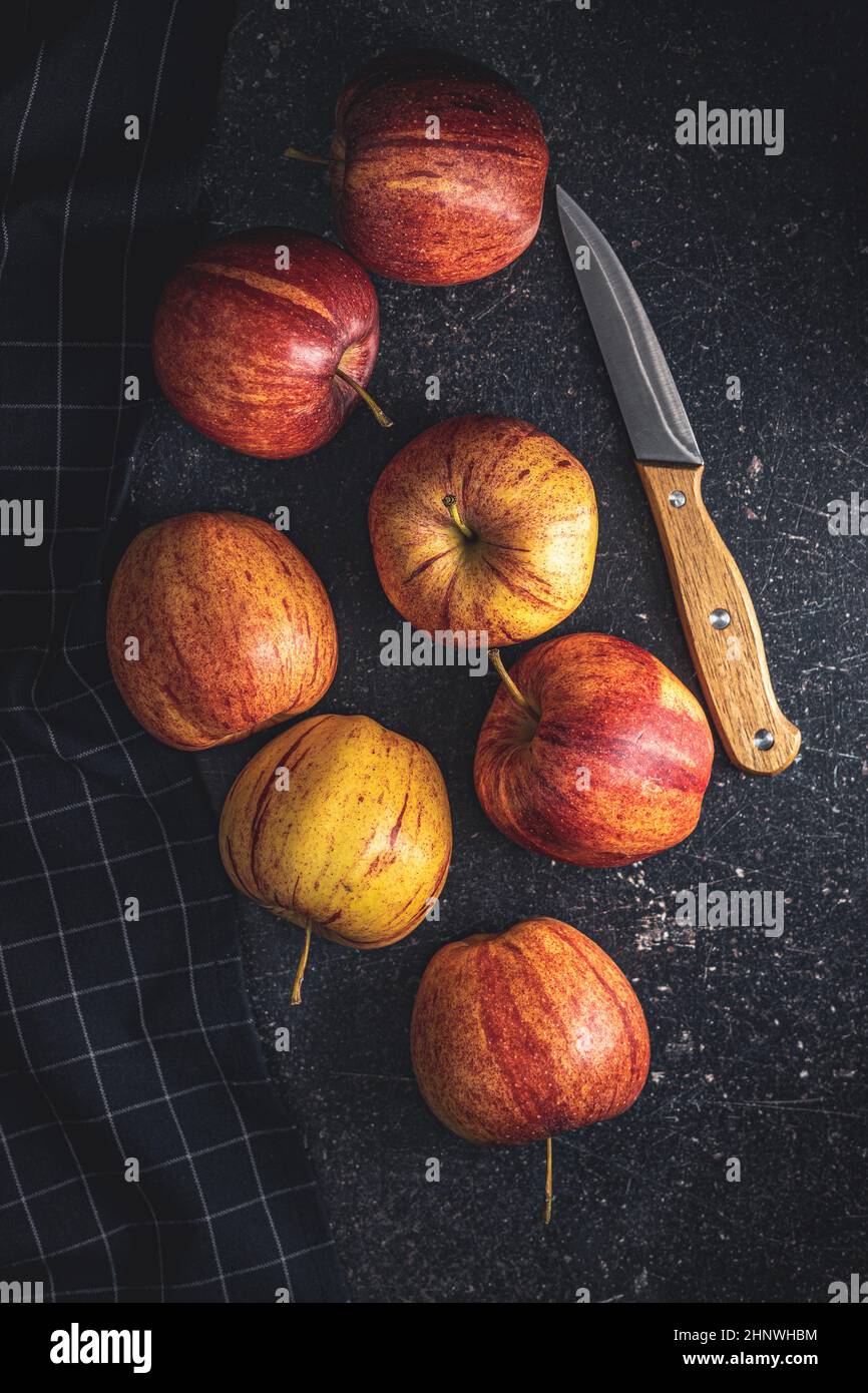 Fresh autumn apples on black table. Top view Stock Photo - Alamy
