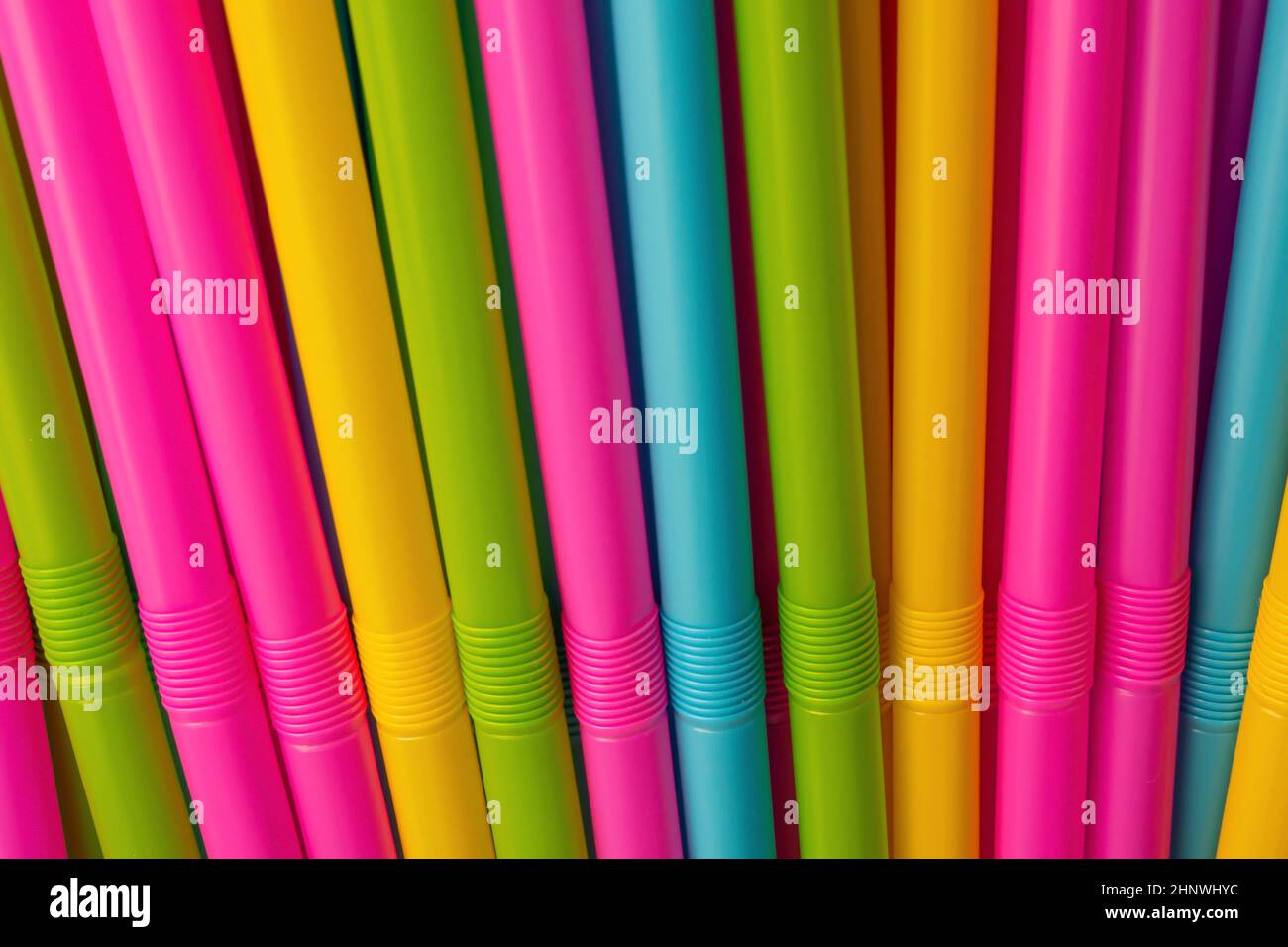 Straw plastic colorful background for drinking water Stock Photo - Alamy