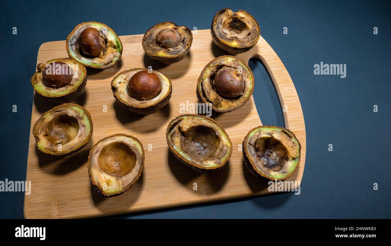 Many Bad Avocado. Creative composition of Ugly Food Fruits Avocado ...