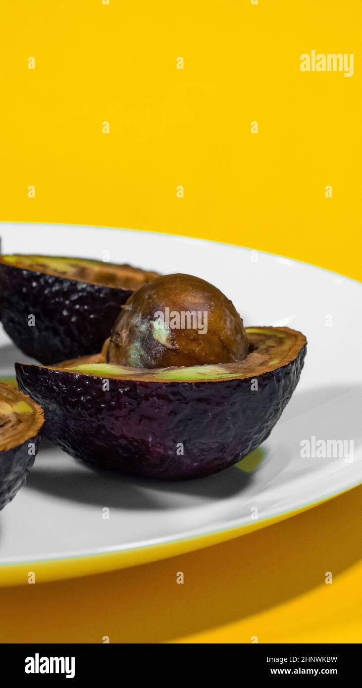 Bad Avocado Close up Vertical Photo. Ugly Tropical fruits. Contaminated ...