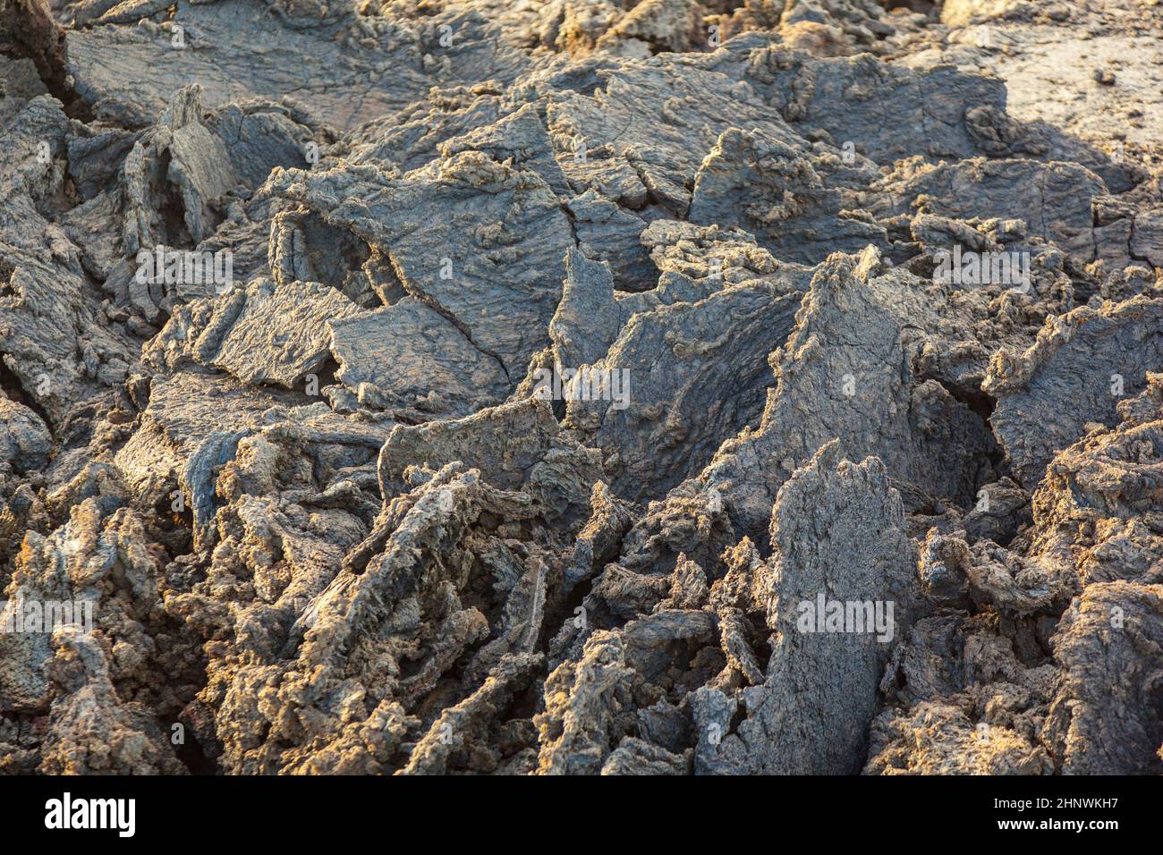 Stones of volcanic flow give a beautiful natural structure Stock Photo ...