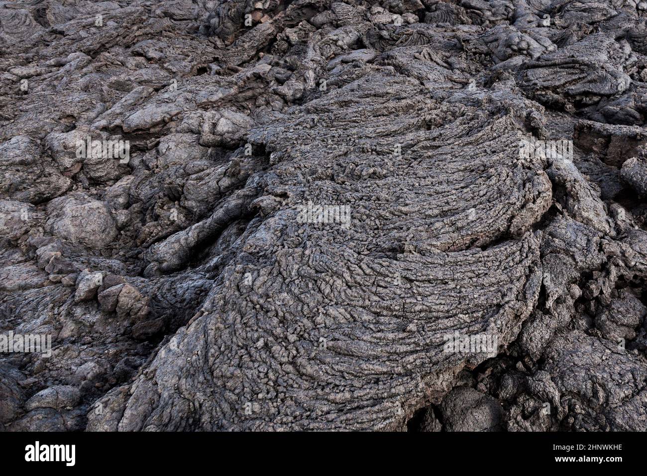 Stones of volcanic flow give a beautiful natural structure Stock Photo ...