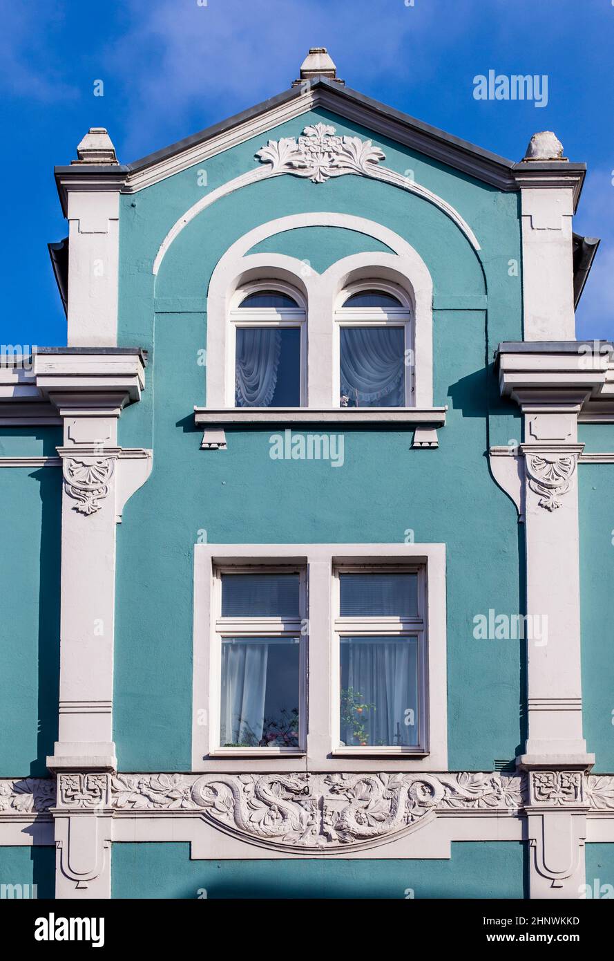 facade with stucco elements of an old house with window Stock Photo - Alamy