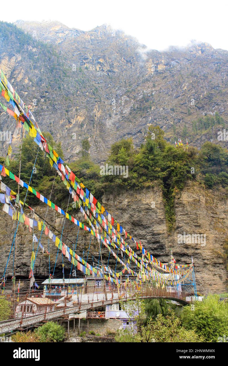 hanging bridge to village of Chame at the Annapurna Circuit, Nepal ...