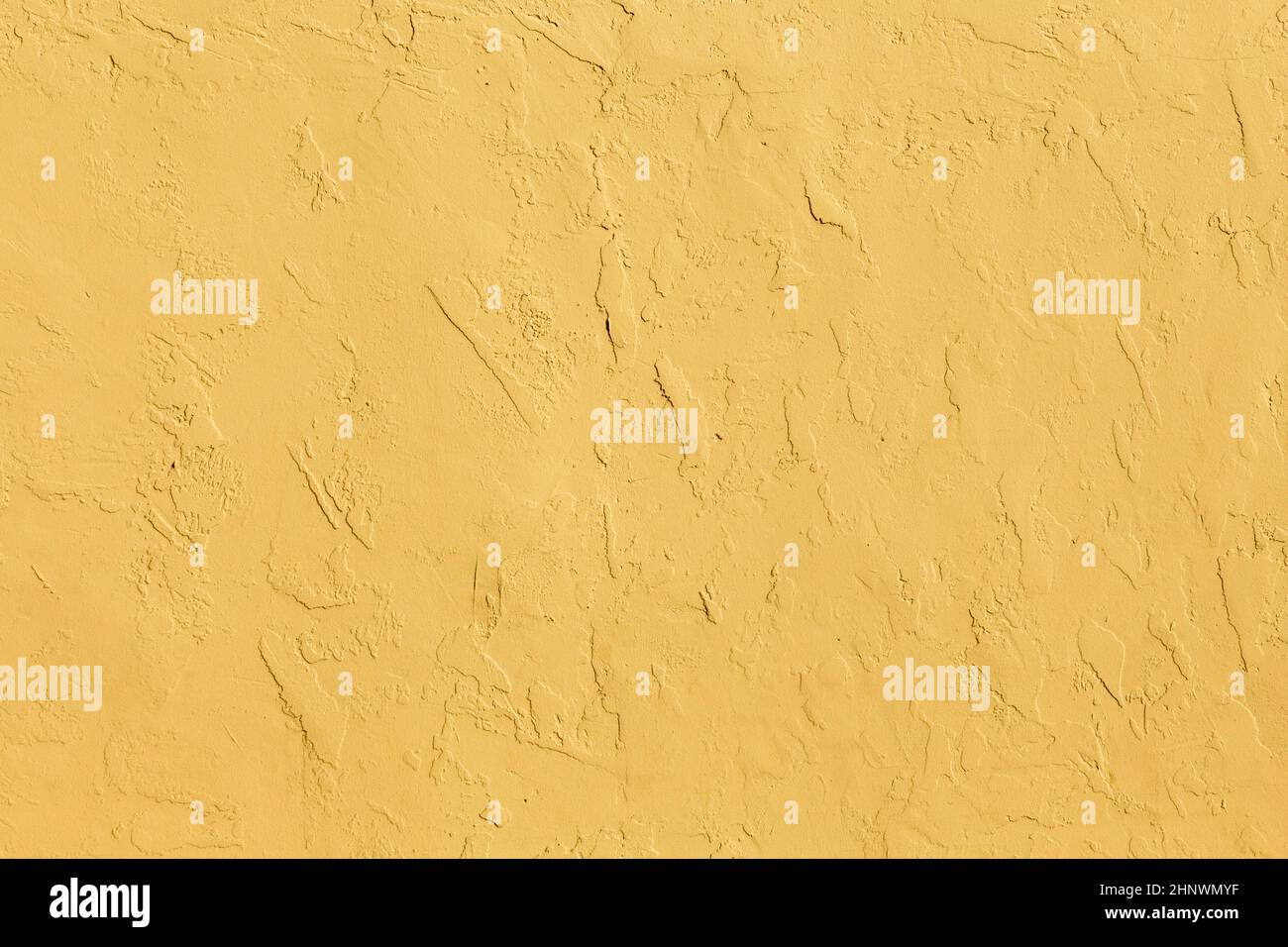 yellow structured plaster wall as harmonic background Stock Photo - Alamy