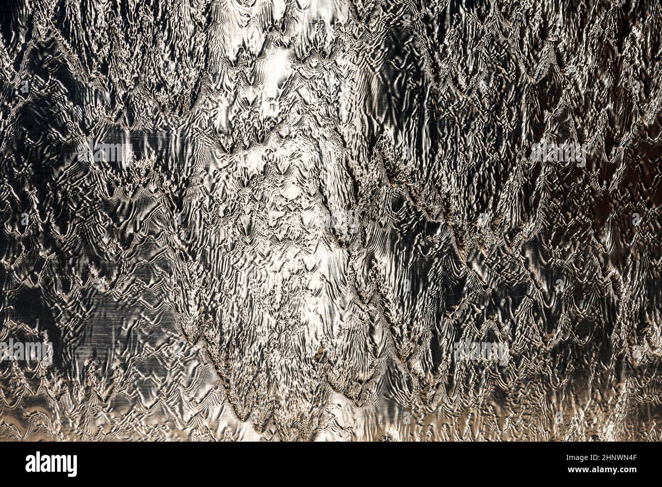 beautiful pattern of flowing water at a metal wall Stock Photo - Alamy