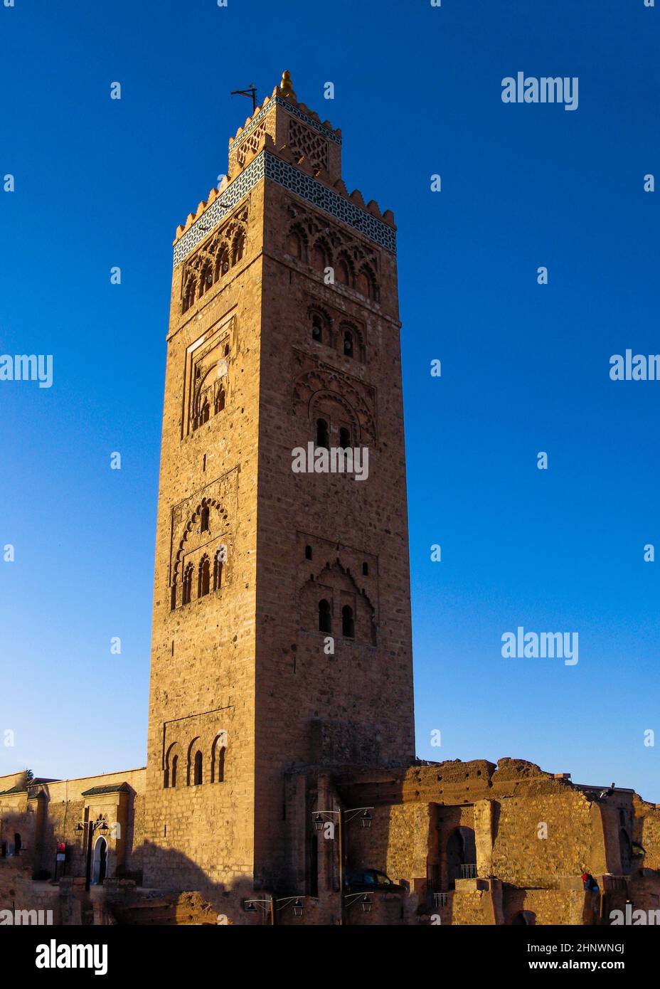 early morning in Marrakesch with view to famous minaret at city wall ...