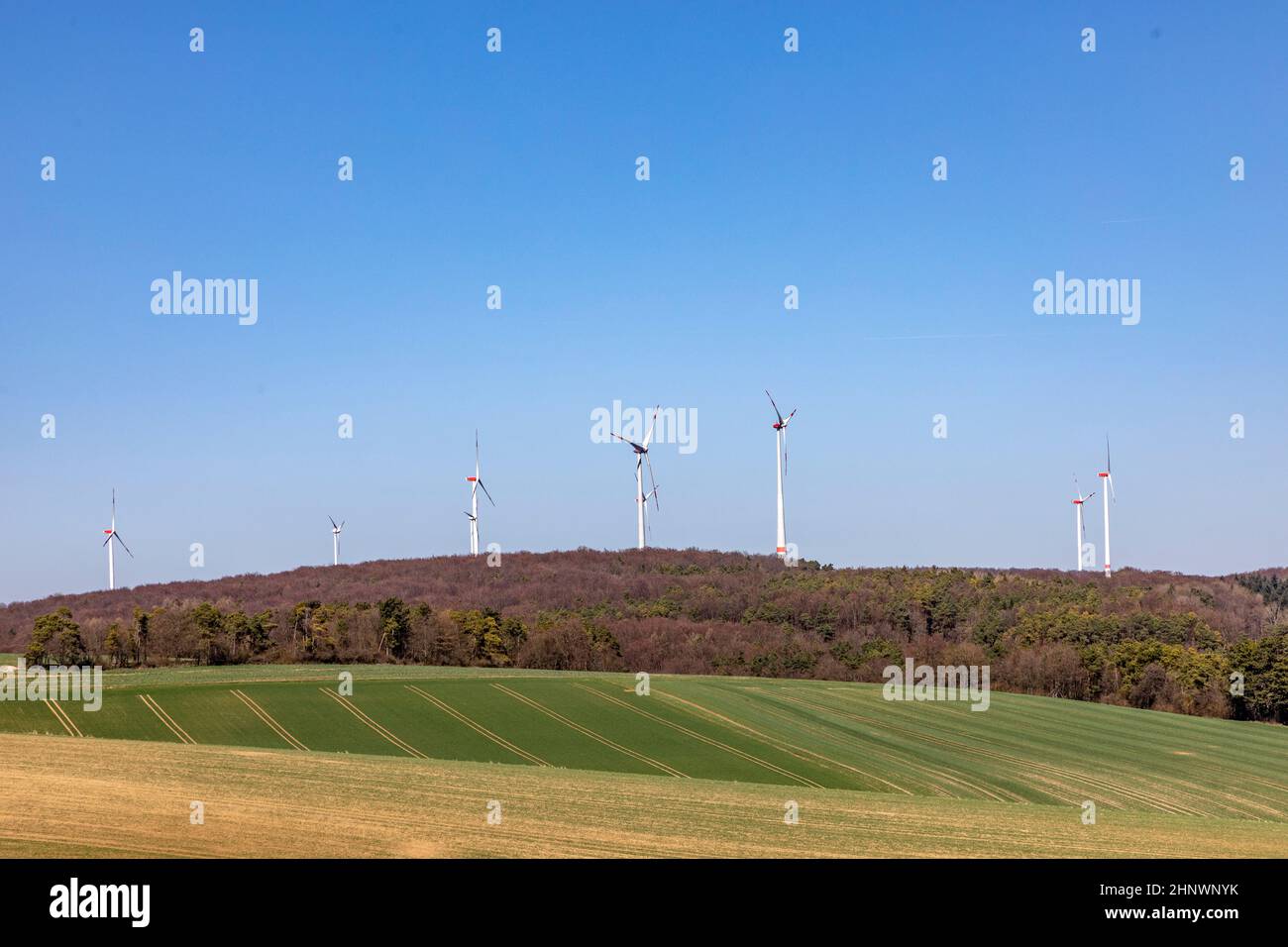 wind generator produces electric power in rural landscape Stock Photo ...
