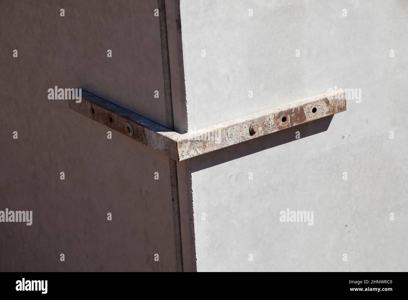 detail of iron angle to keep prefabricated concrete walls in position ...