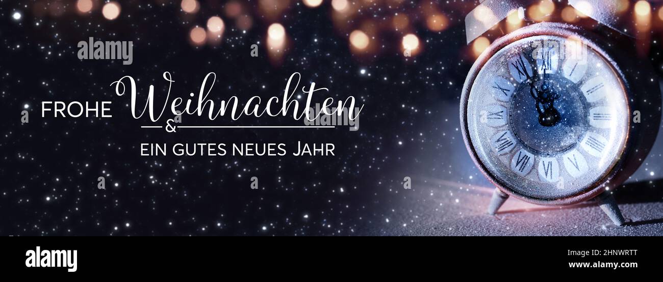 Christmas and new year countdown with a alarm clock on night sky and ...
