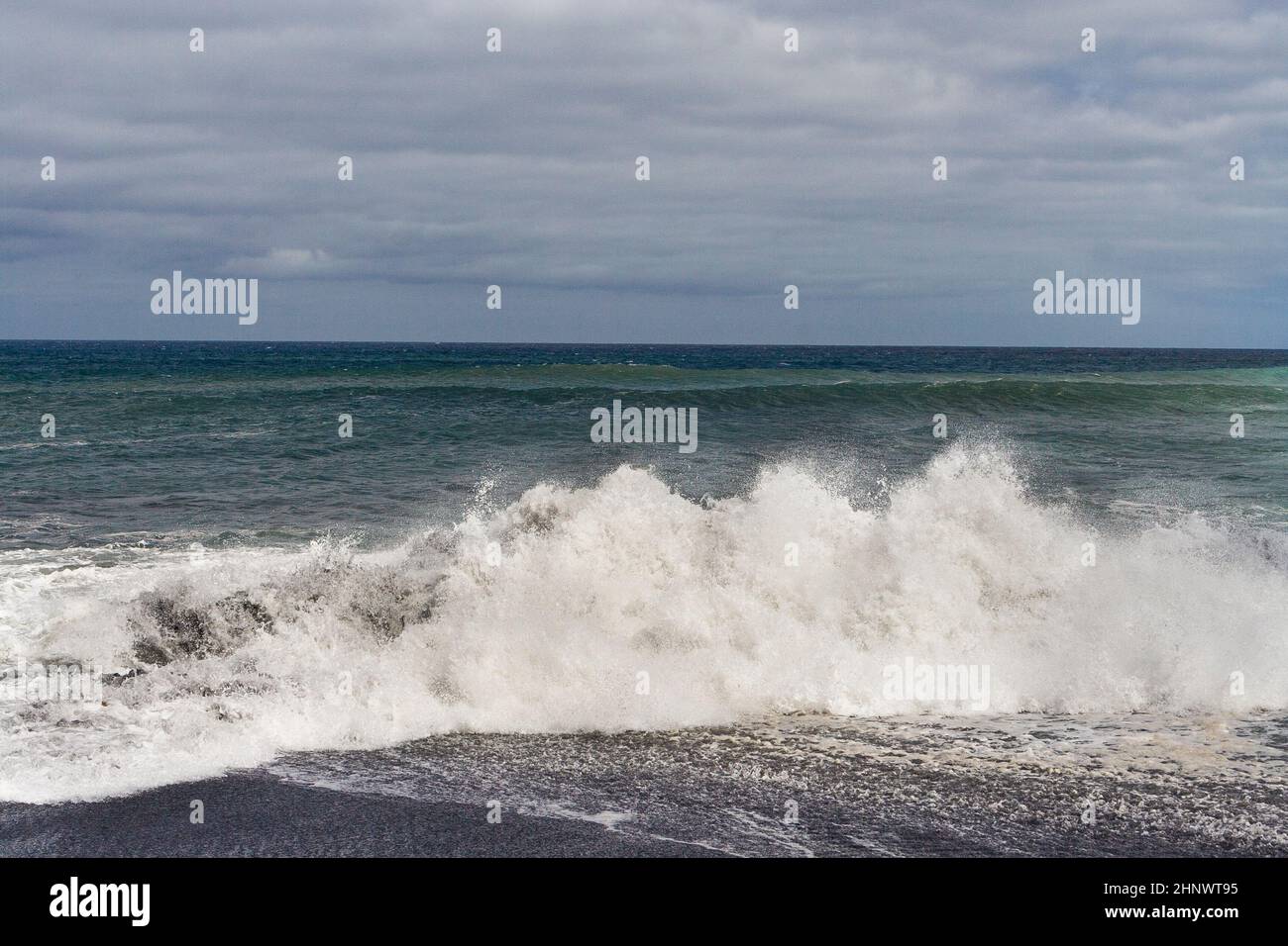 heavy waves with white wave crest in storm at the beach Stock Photo - Alamy
