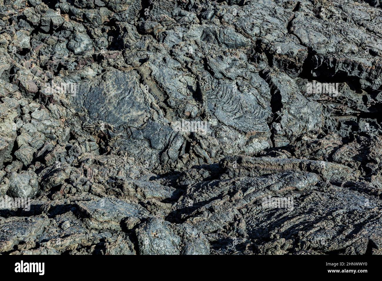 Stones of volcanic flow give a beautiful natural structure Stock Photo ...