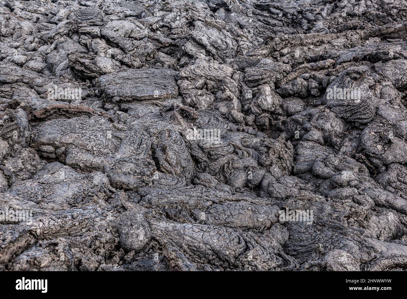 Stones of volcanic flow give a beautiful natural structure Stock Photo ...