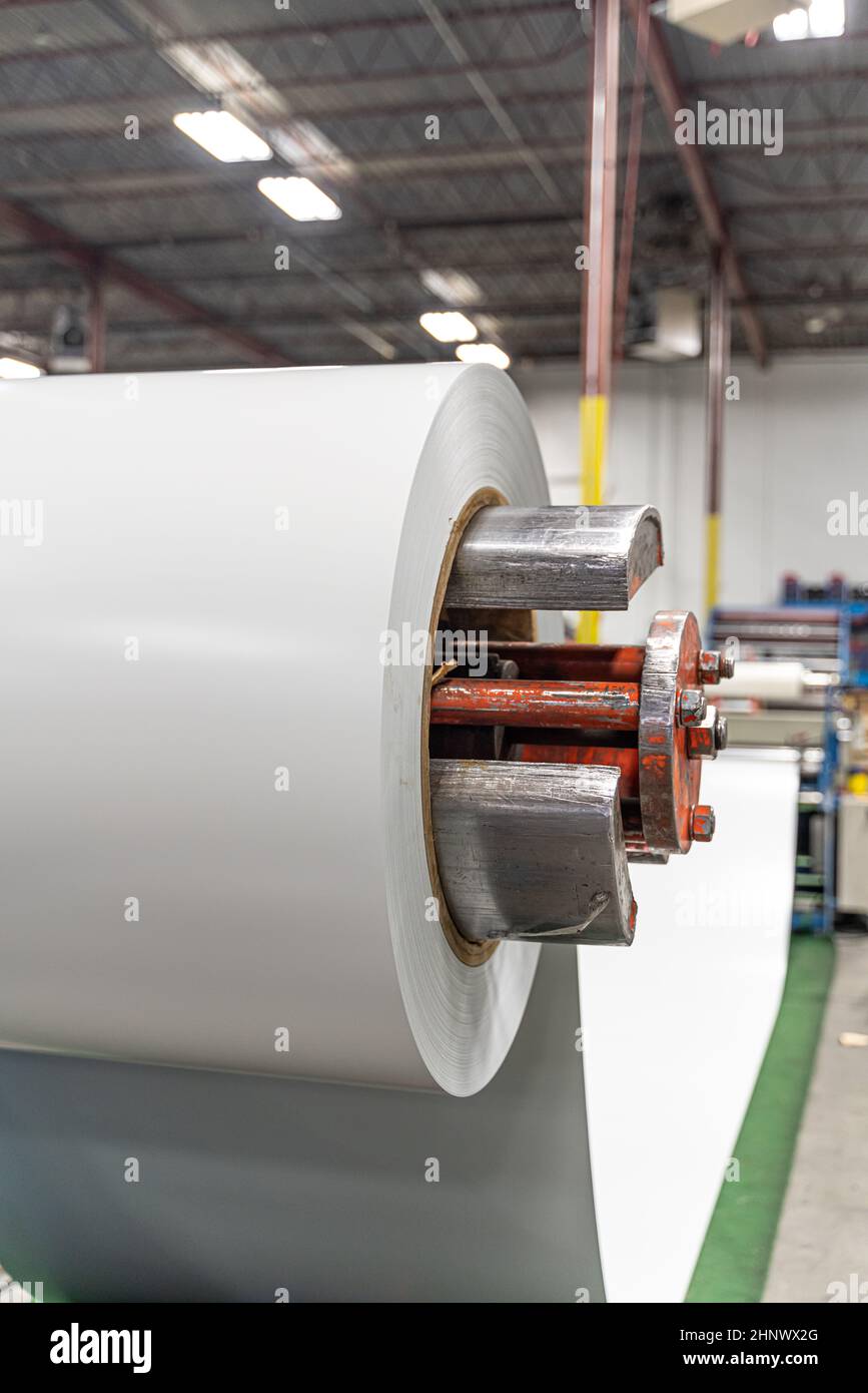 roll of silver metal steel coil in a metal roofing factory Stock Photo ...