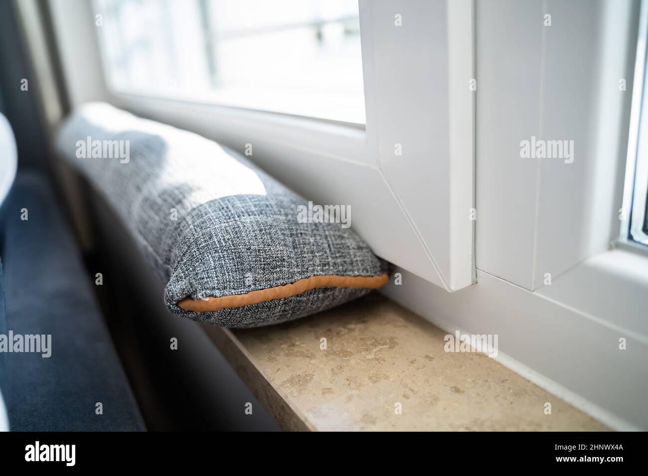Draft Excluder Under Window Blocking Cold Air From Traveling Around ...