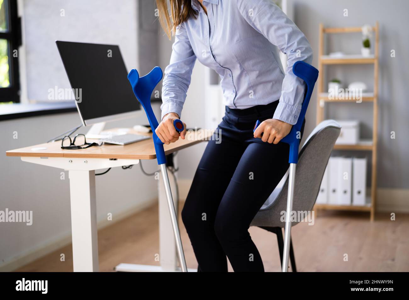 Injured Worker Rehabilitation In Office. Workplace Benefits Stock Photo ...