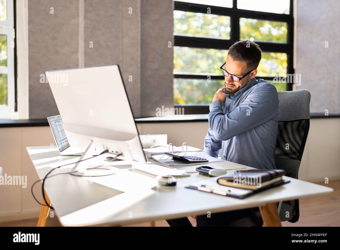 Shoulder Pain And Posture. Man Suffering Near Workstation Computer ...