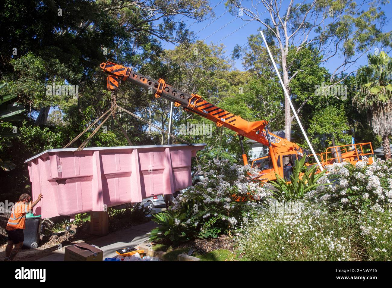 Sydney,fibreglass swimming pool being carried lifted by mobile crane ...