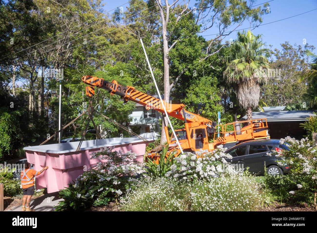 Crane lifting pool hi-res stock photography and images - Alamy