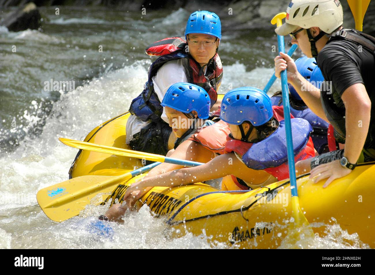 Tourists taking a whitewater raft trip on the Oconee River of Tennessee ...