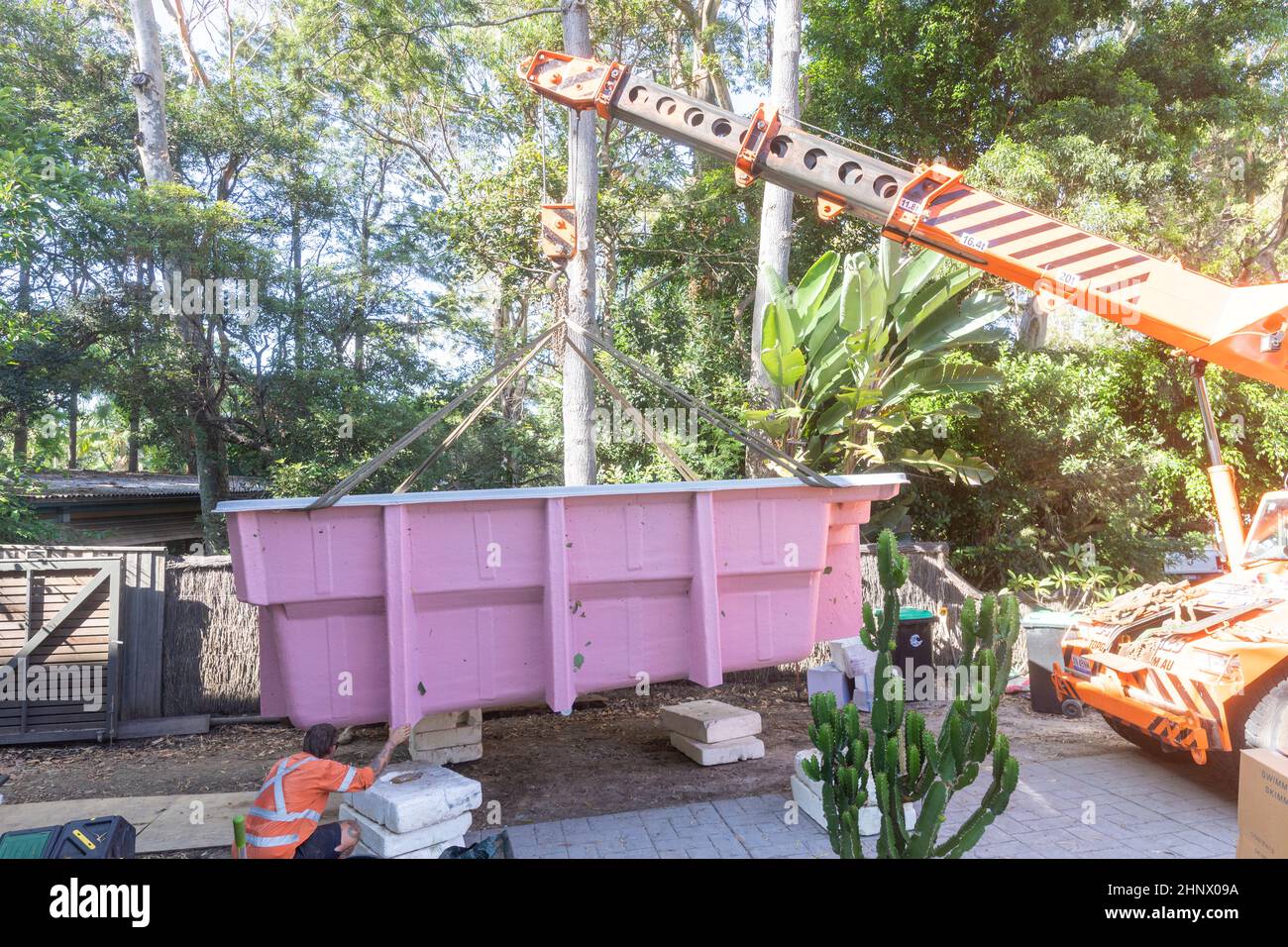 Sydney,fibreglass swimming pool being carried lifted by mobile crane ...
