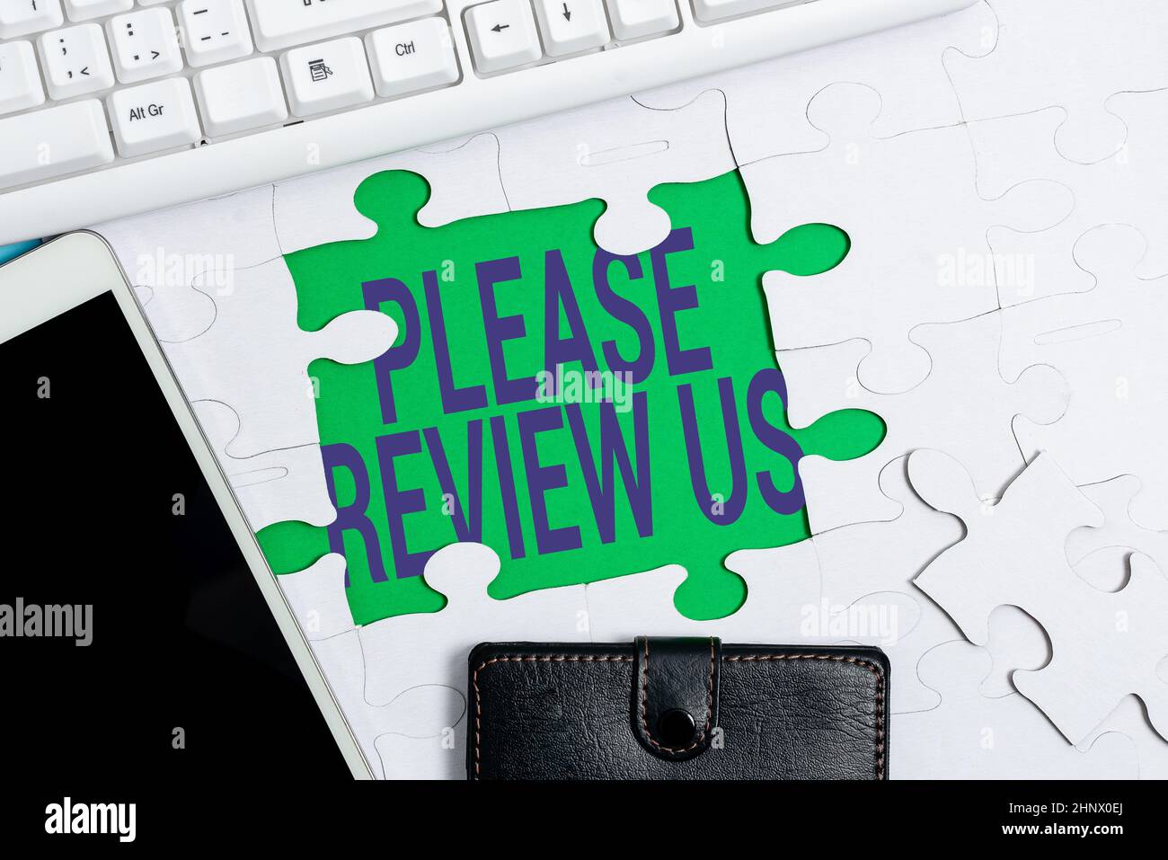 Hand writing sign Please Review Us, Word for situation or system is ...