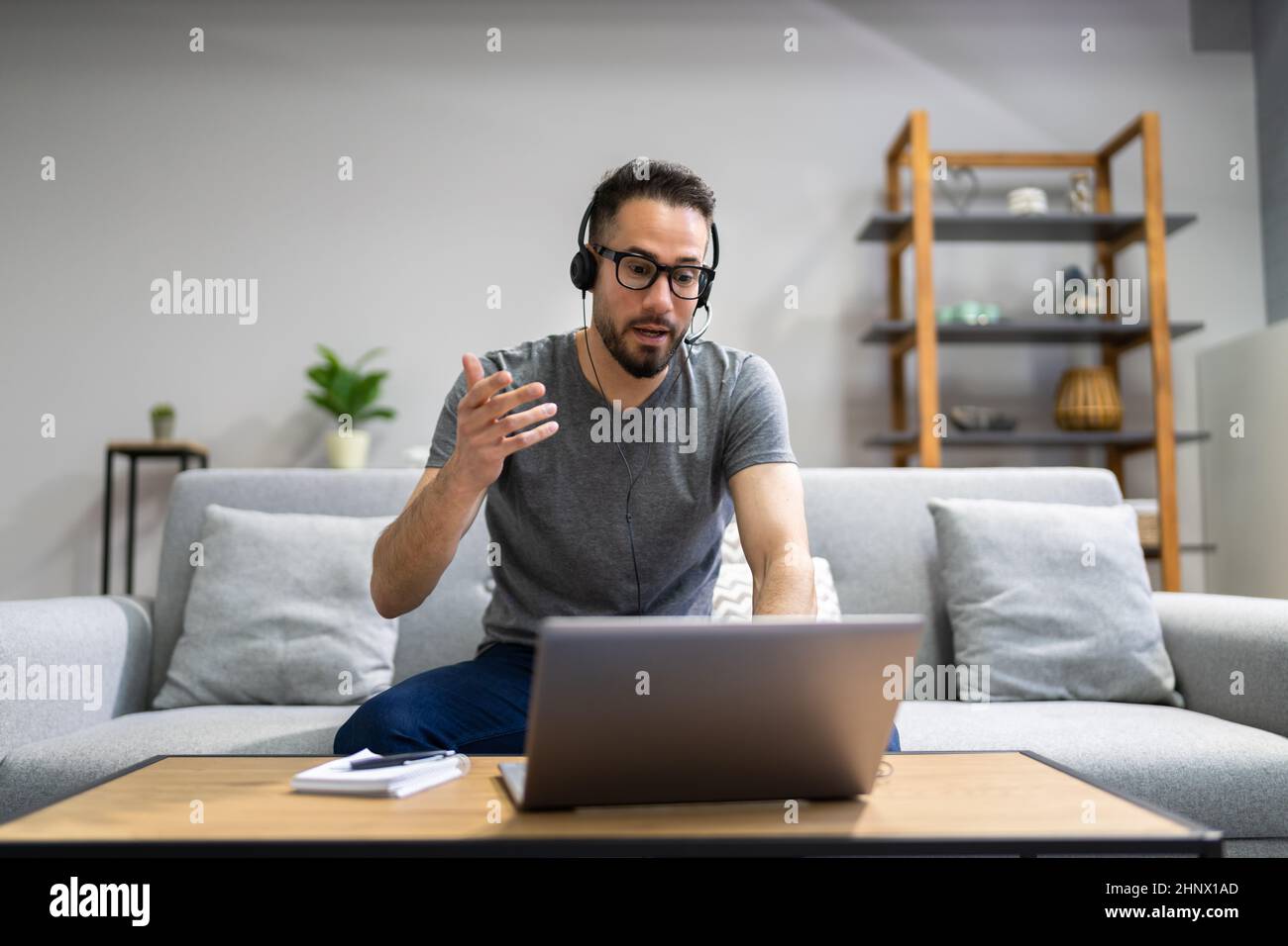 Man on laptop learning from behind hi-res stock photography and images ...