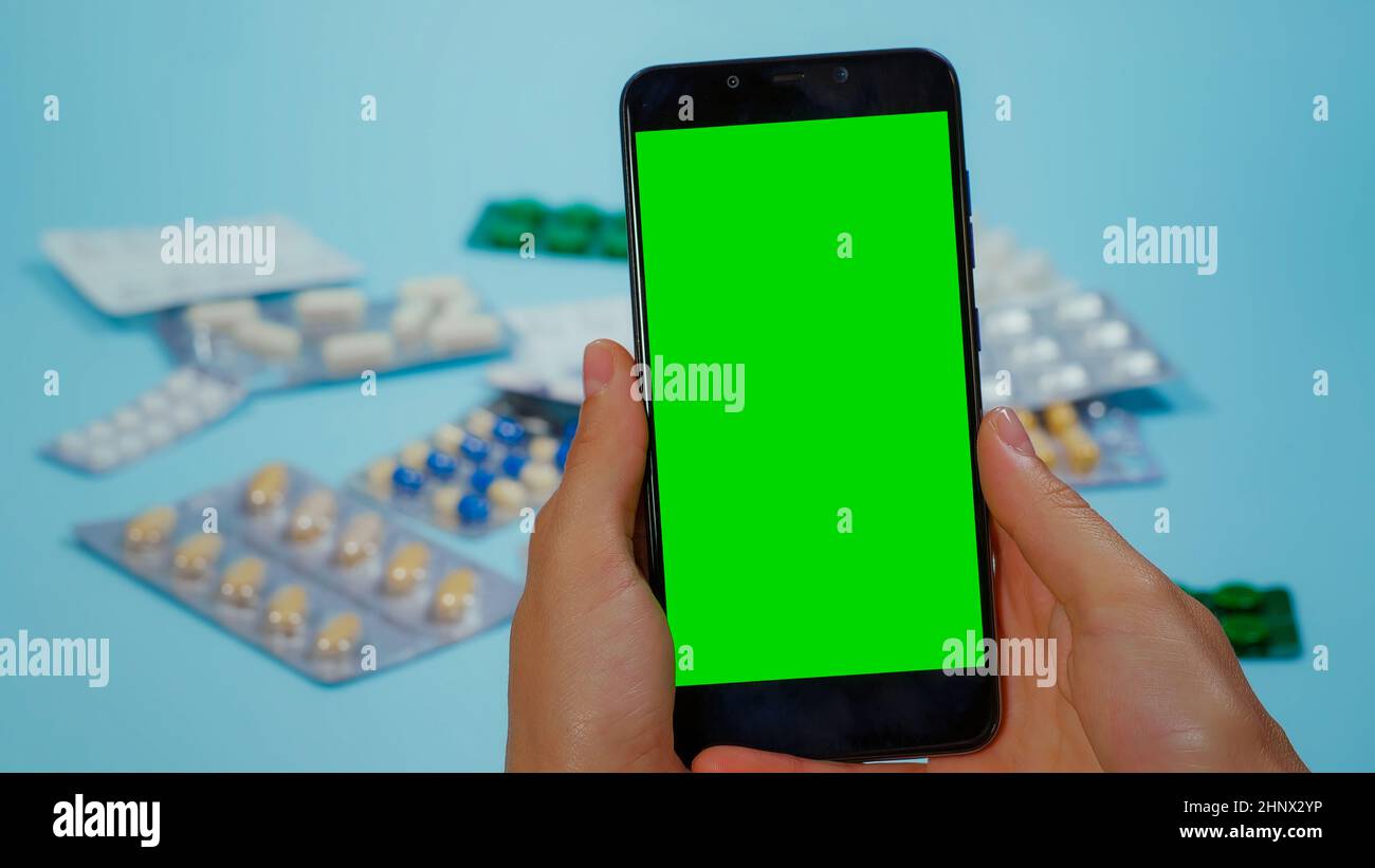 Close up Holding Phone with Chroma Key Display. Phramaceutical use ...