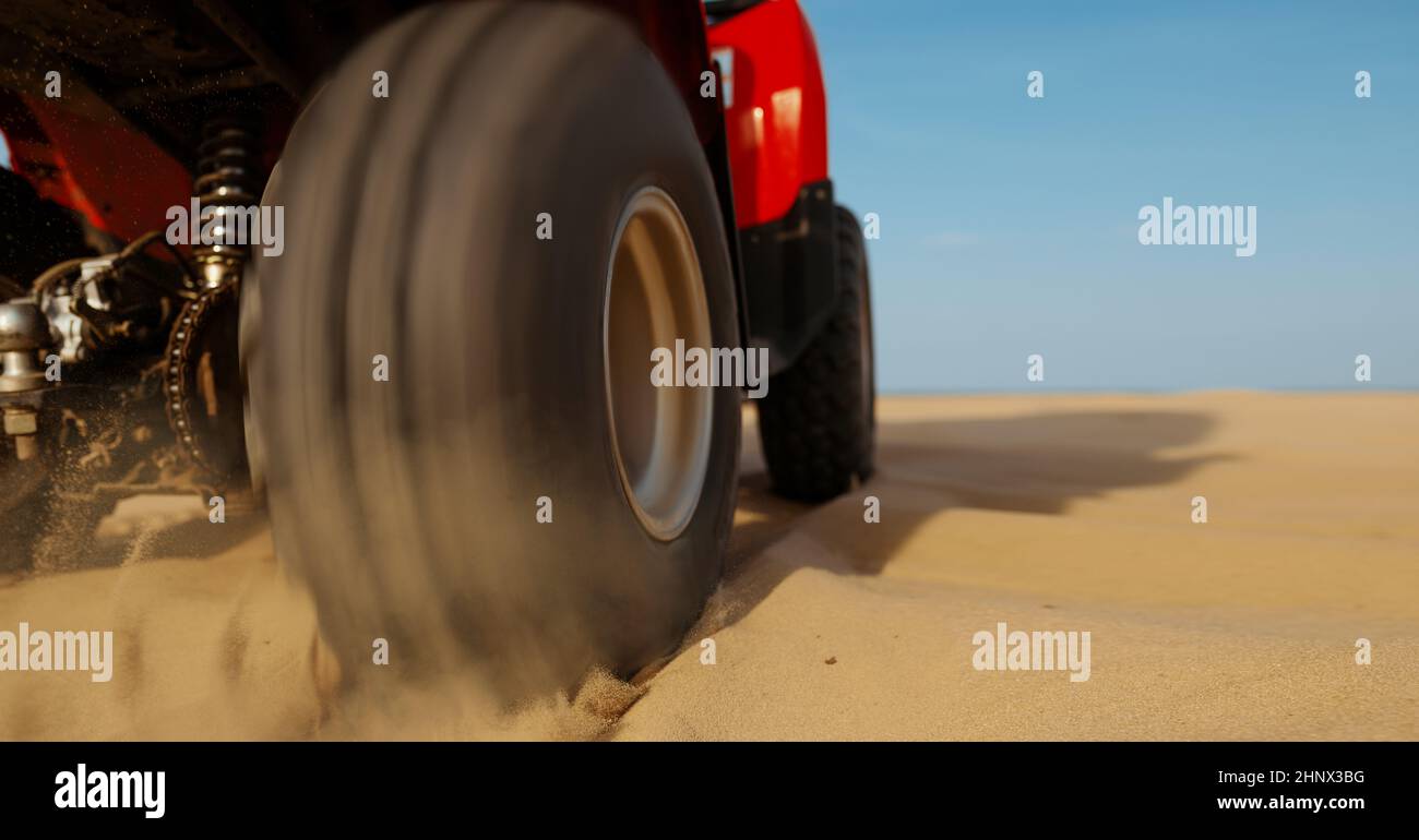 Atv in desert, closeup view on wheel, nobody. Quad bike, sandy race ...
