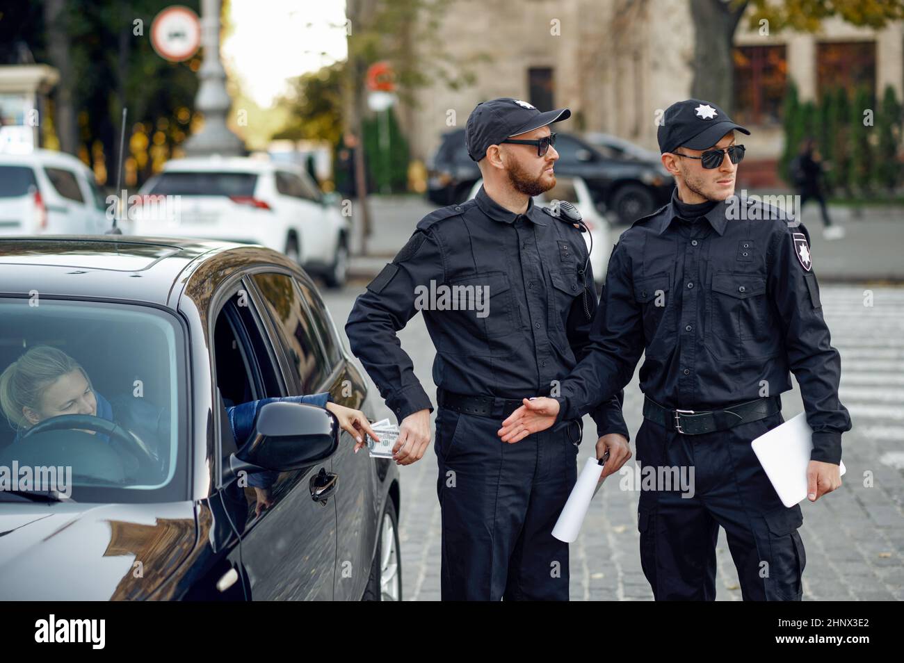 Corrupt police officer hi-res stock photography and images - Alamy