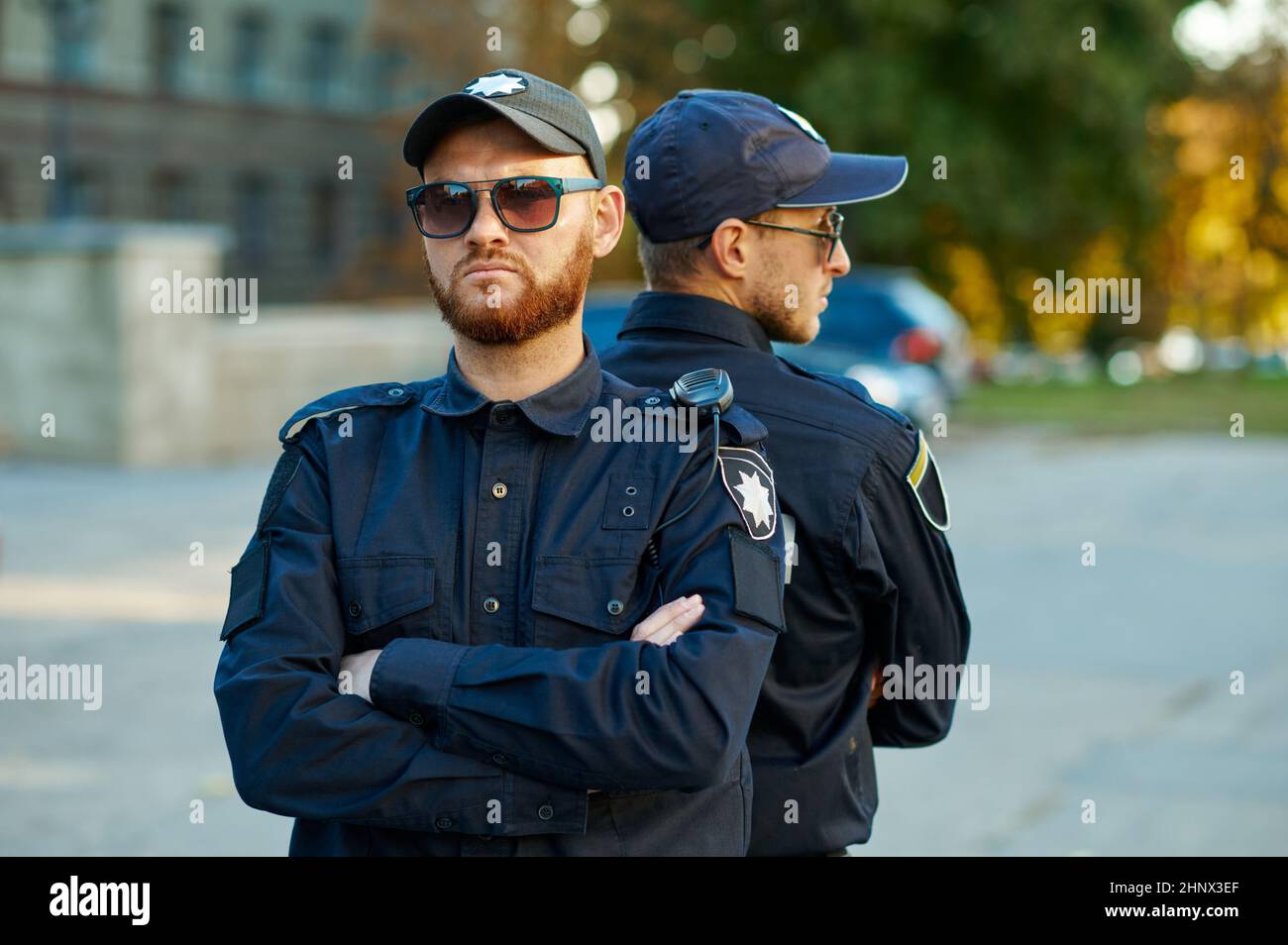 Police officer standing uniform on duty transportation hi-res stock ...