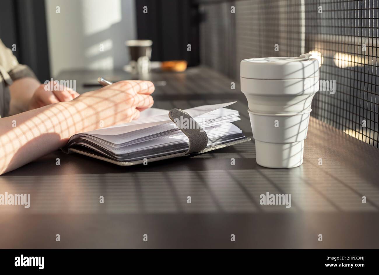 Writing at table hi-res stock photography and images - Alamy