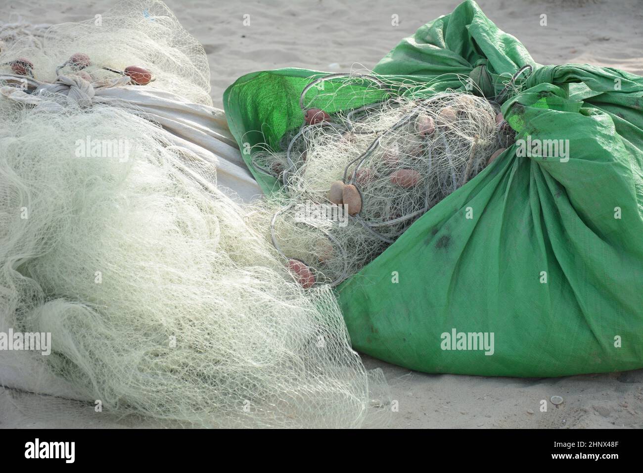 Fishing nets with buoys and ropes. Fishing nets ropes and floats on a ...