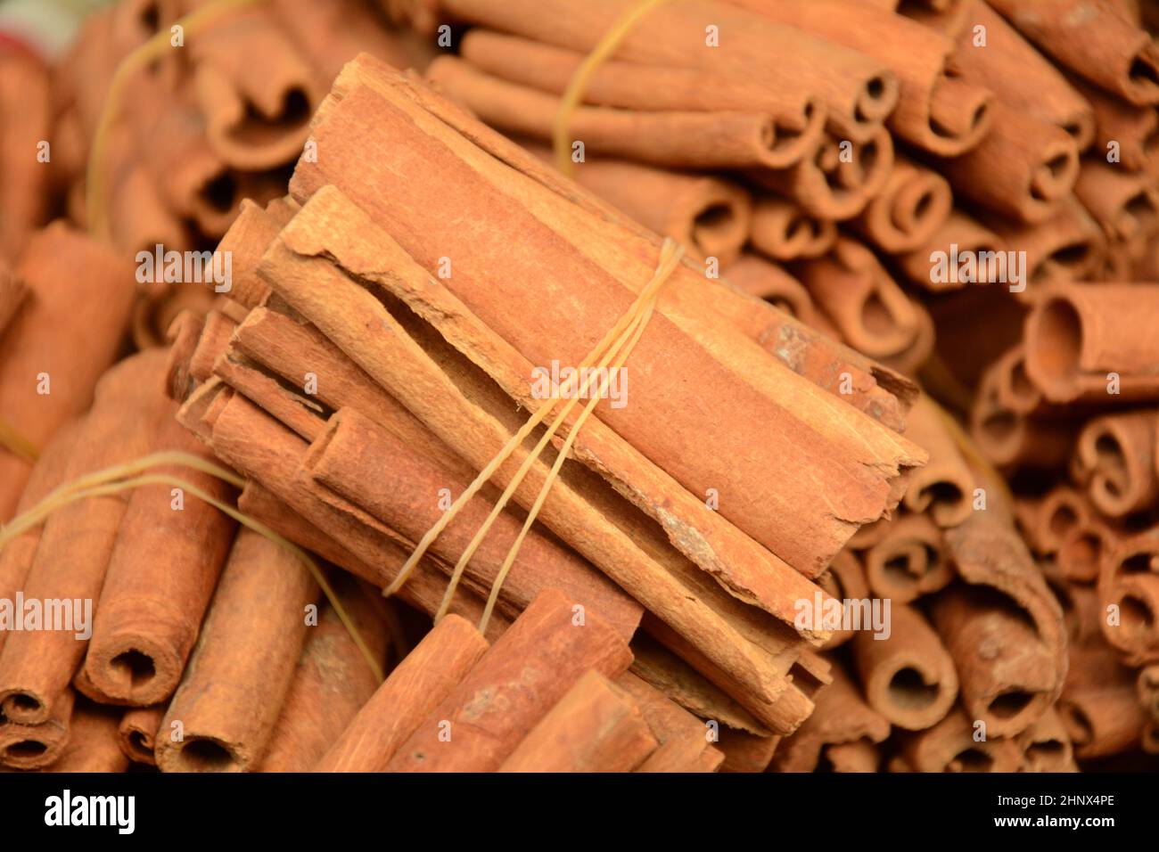 Natural dried bark cinnamon in front of spice shop in the Turkish ...