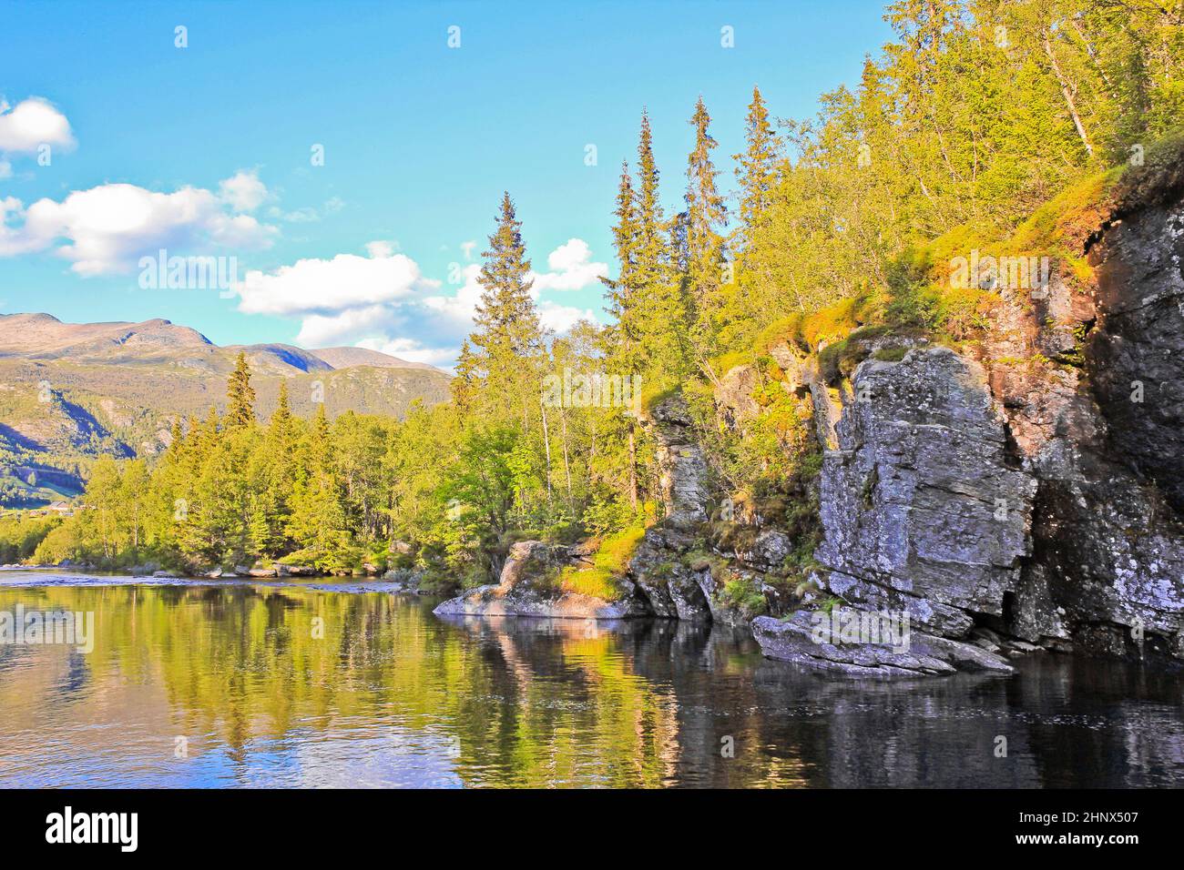 River of the beautiful waterfall Rjukandefossen with mountain and ...