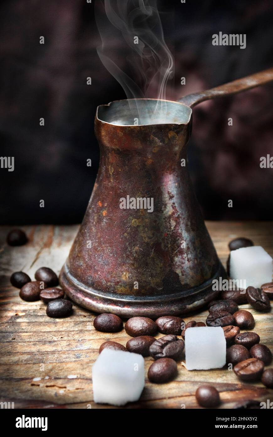 Old-fashioned oriental coffee pot on grunge wooden plank Stock Photo ...