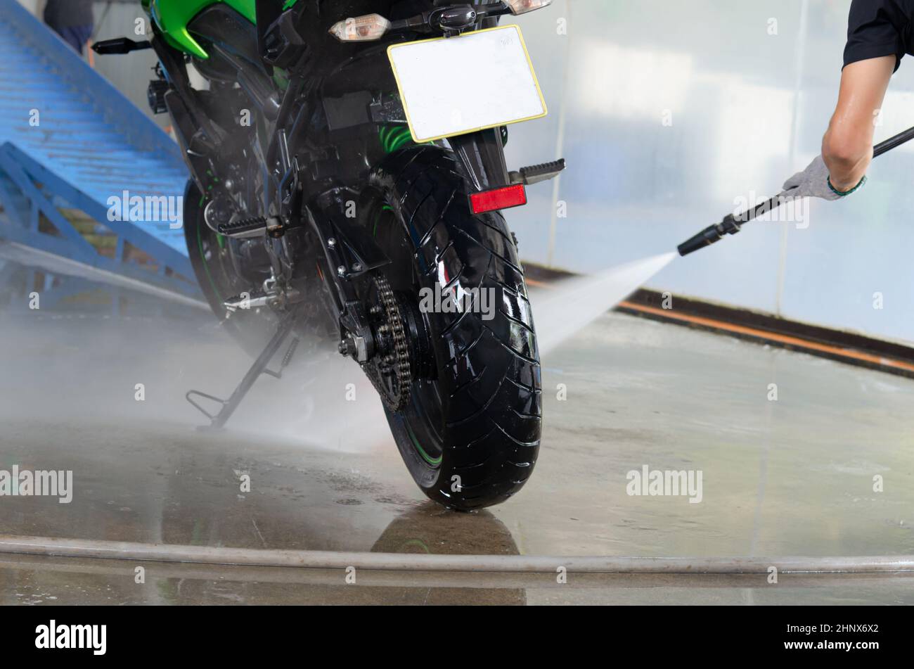 Motorcycle wash man cleaning hi-res stock photography and images - Alamy