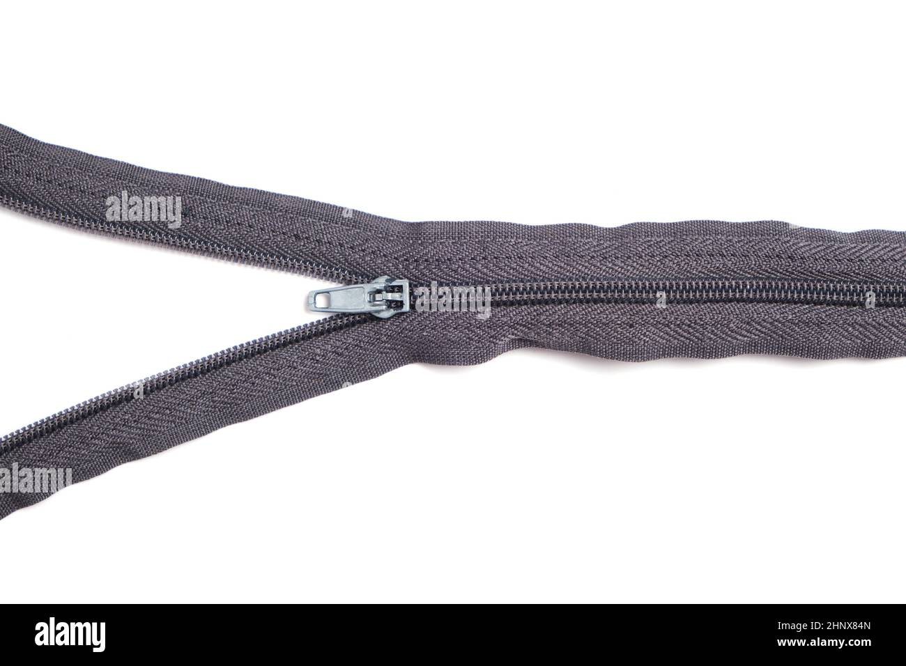 Zipper closure on a white background isolate Stock Photo - Alamy