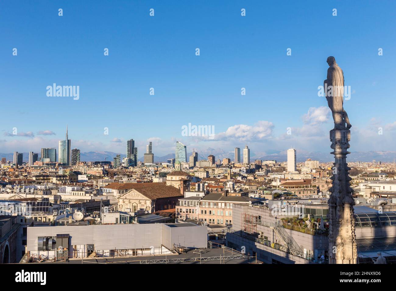 skyline of milan from famous Milan Cathedral under blue sky Stock Photo ...
