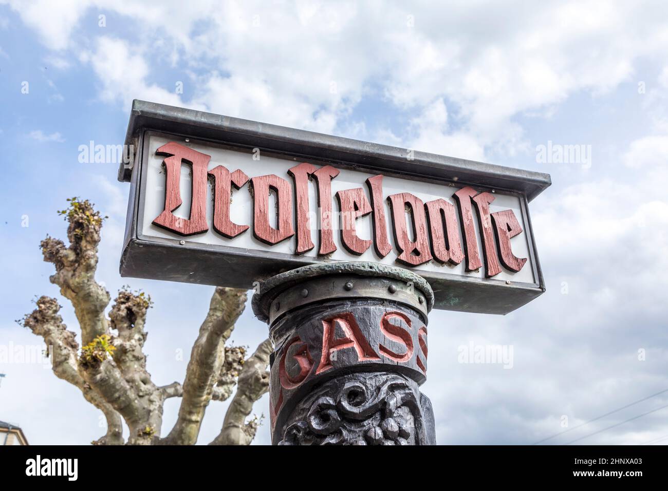 sign Drosselgasse in Ruedesheim, Germany. This narrow street is the ...
