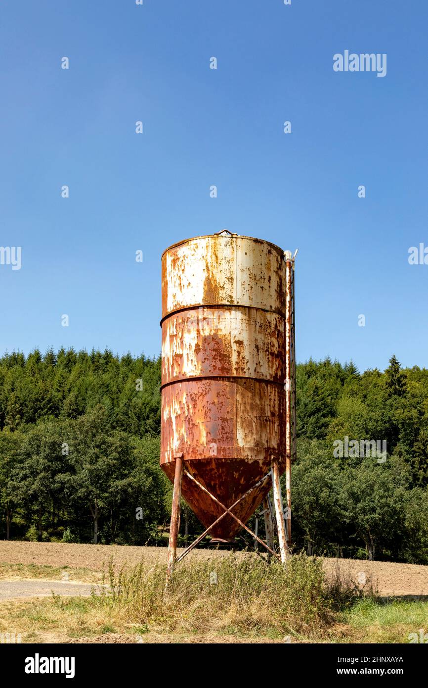 landscape with old rusty silo at the field Stock Photo - Alamy